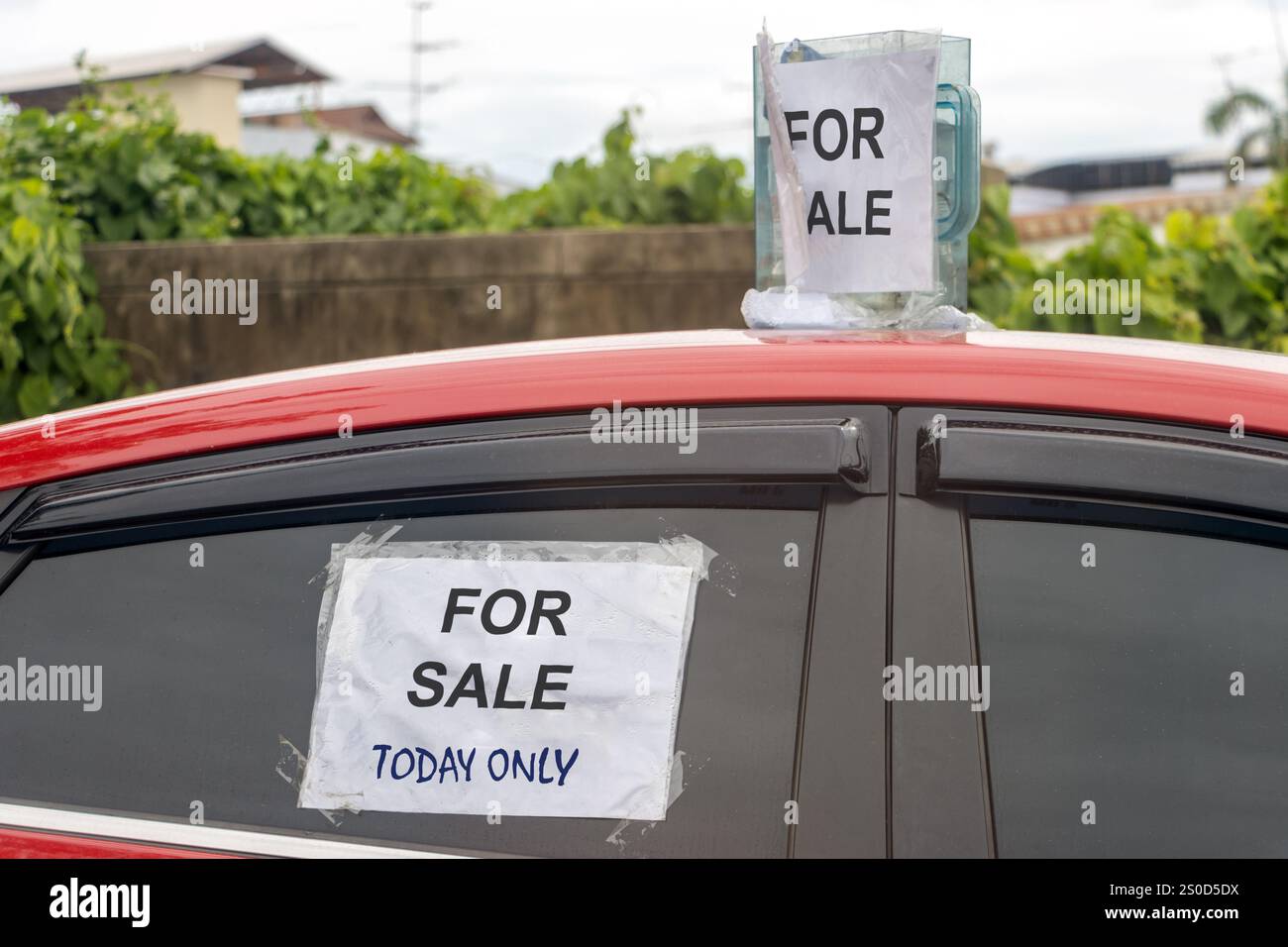 The car is parked on the street with a limited time offer for sale ...