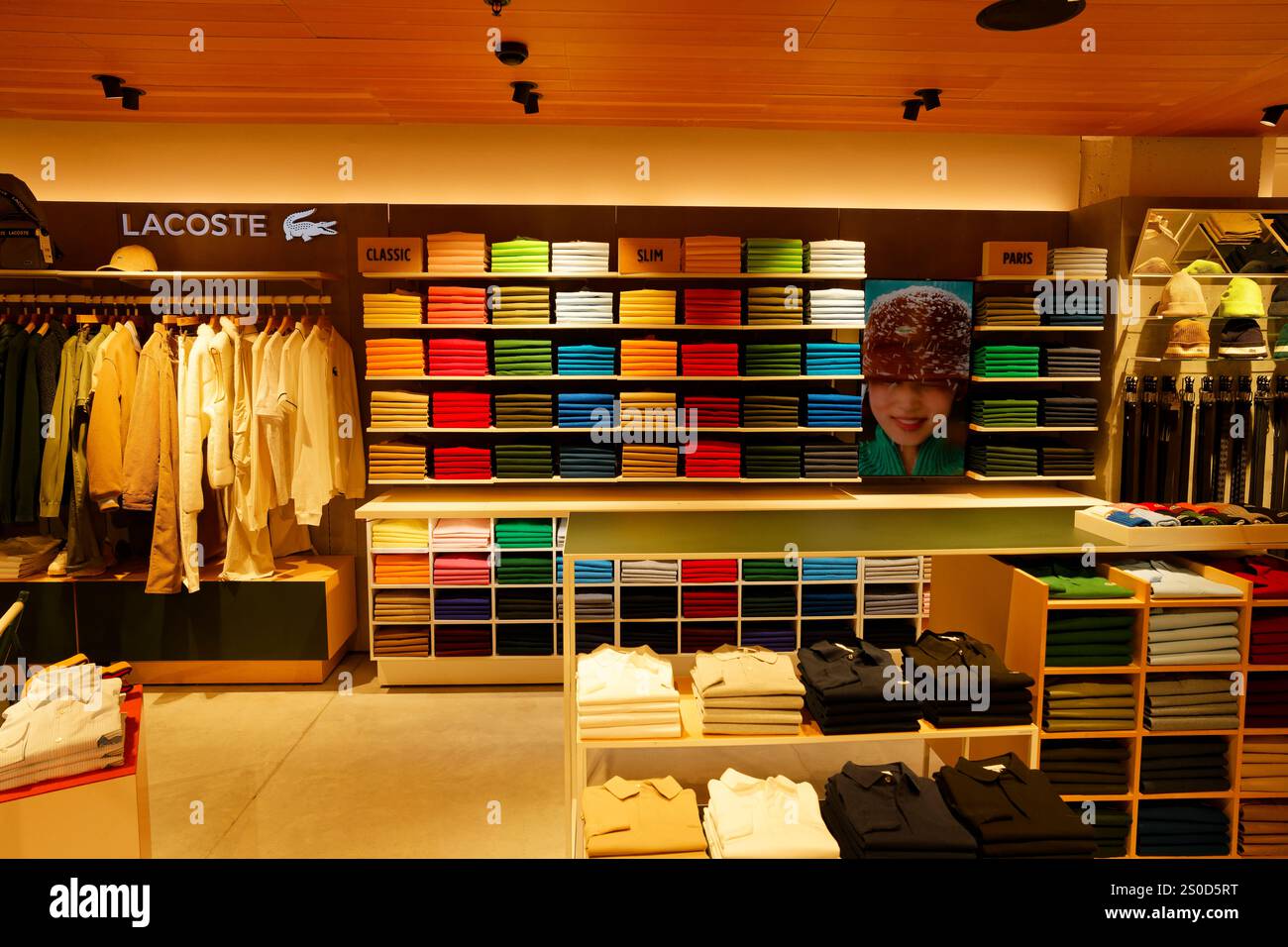 Clothing store interior showcasing vibrant polo shirts in various ...