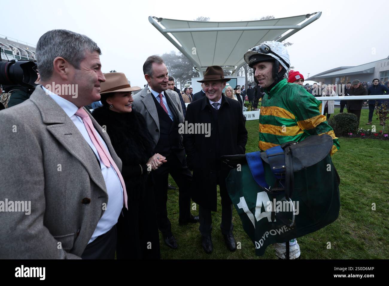 Jockey Mark Walsh with supporters after winning in the Paddy Power ...