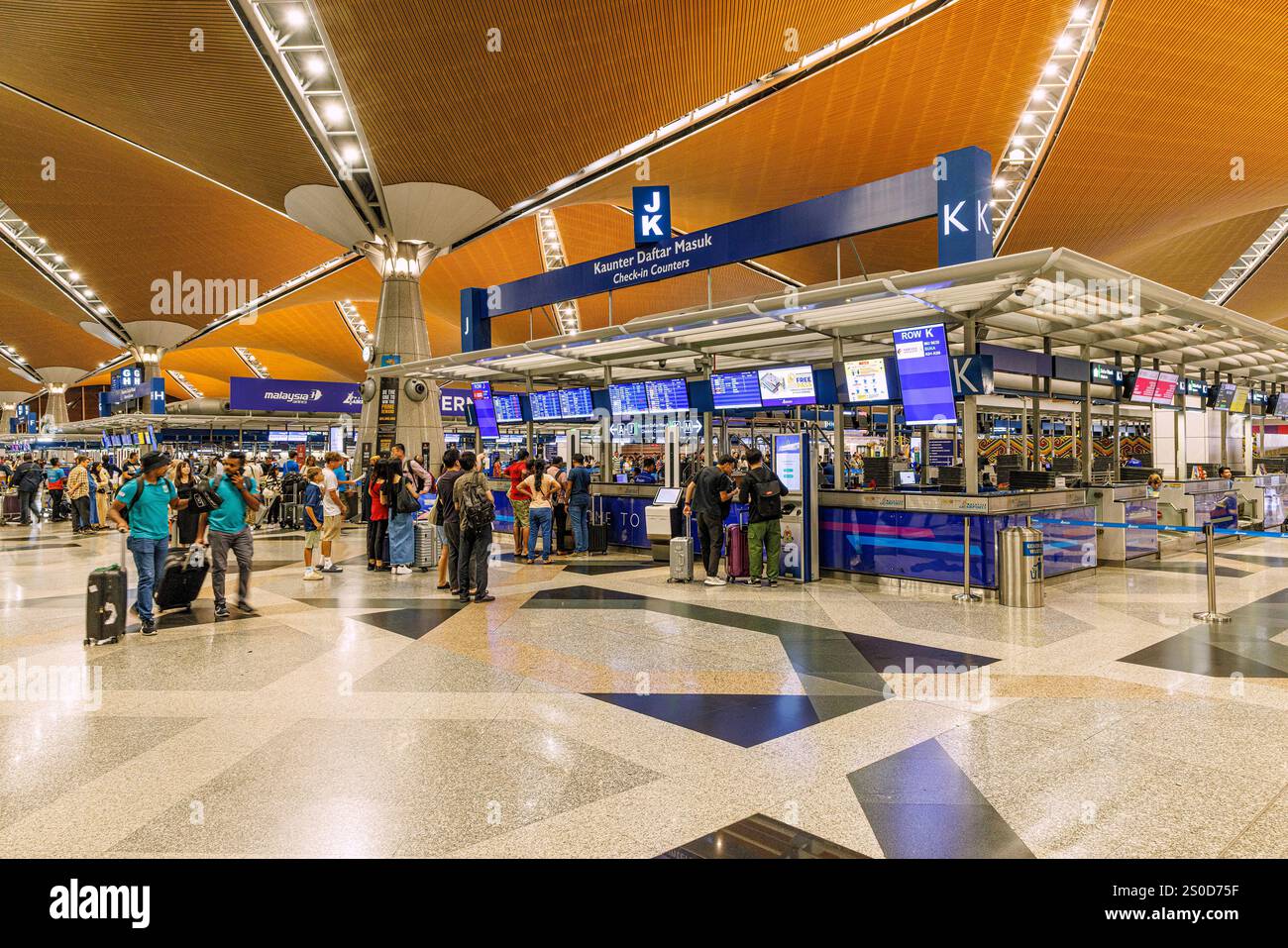Check in desk at airport, Kuala Lumpur, Malaysia Stock Photo - Alamy