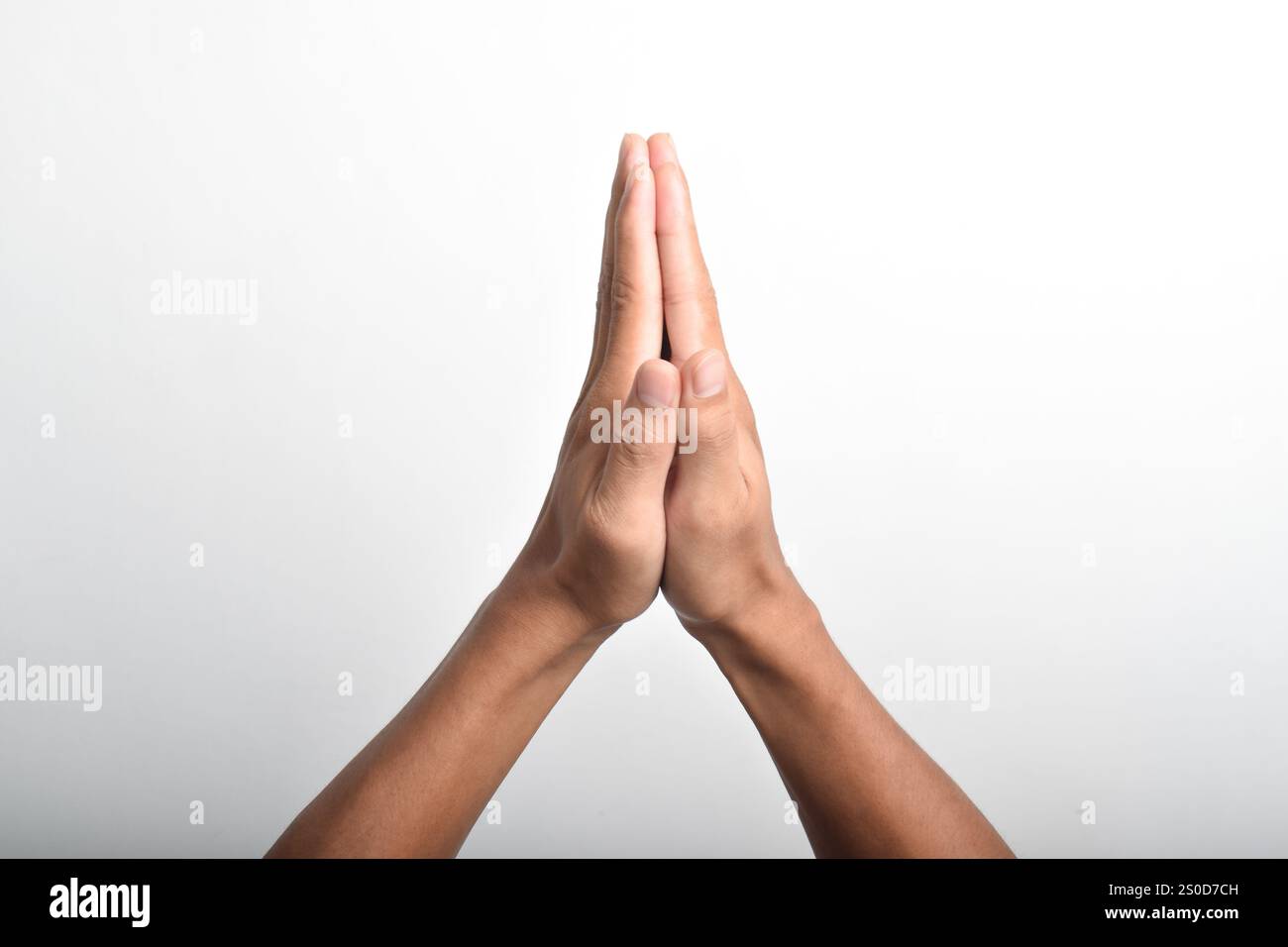 Praying hands with faith in religion and belief in God on a white ...