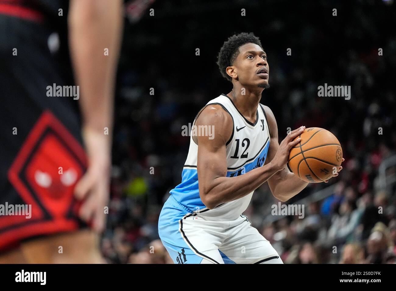 Atlanta Hawks forward De'Andre Hunter (12) shoots against the Chicago ...
