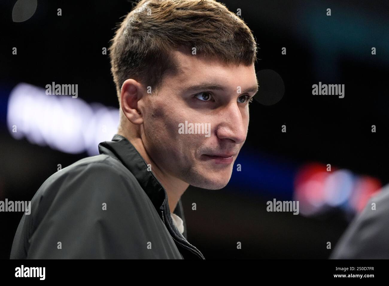 Atlanta Hawks guard Bogdan Bogdanovic speaks to a player as he is out ...