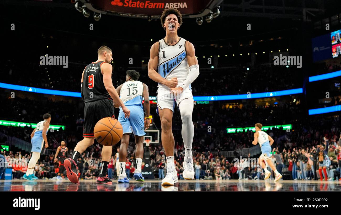 Atlanta Hawks forward Jalen Johnson (1) celebrates his dunk against the ...
