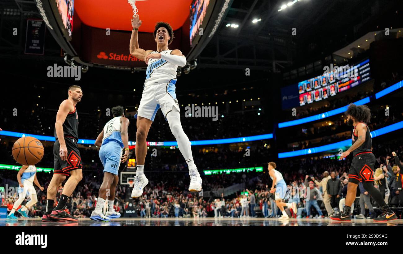 Atlanta Hawks forward Jalen Johnson (1) celebrates his dunk against the ...