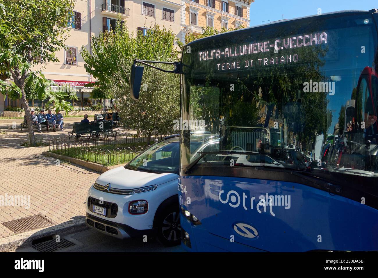 Civitavecchia, Italia - December 27, 2024: Blue public bus and parked ...