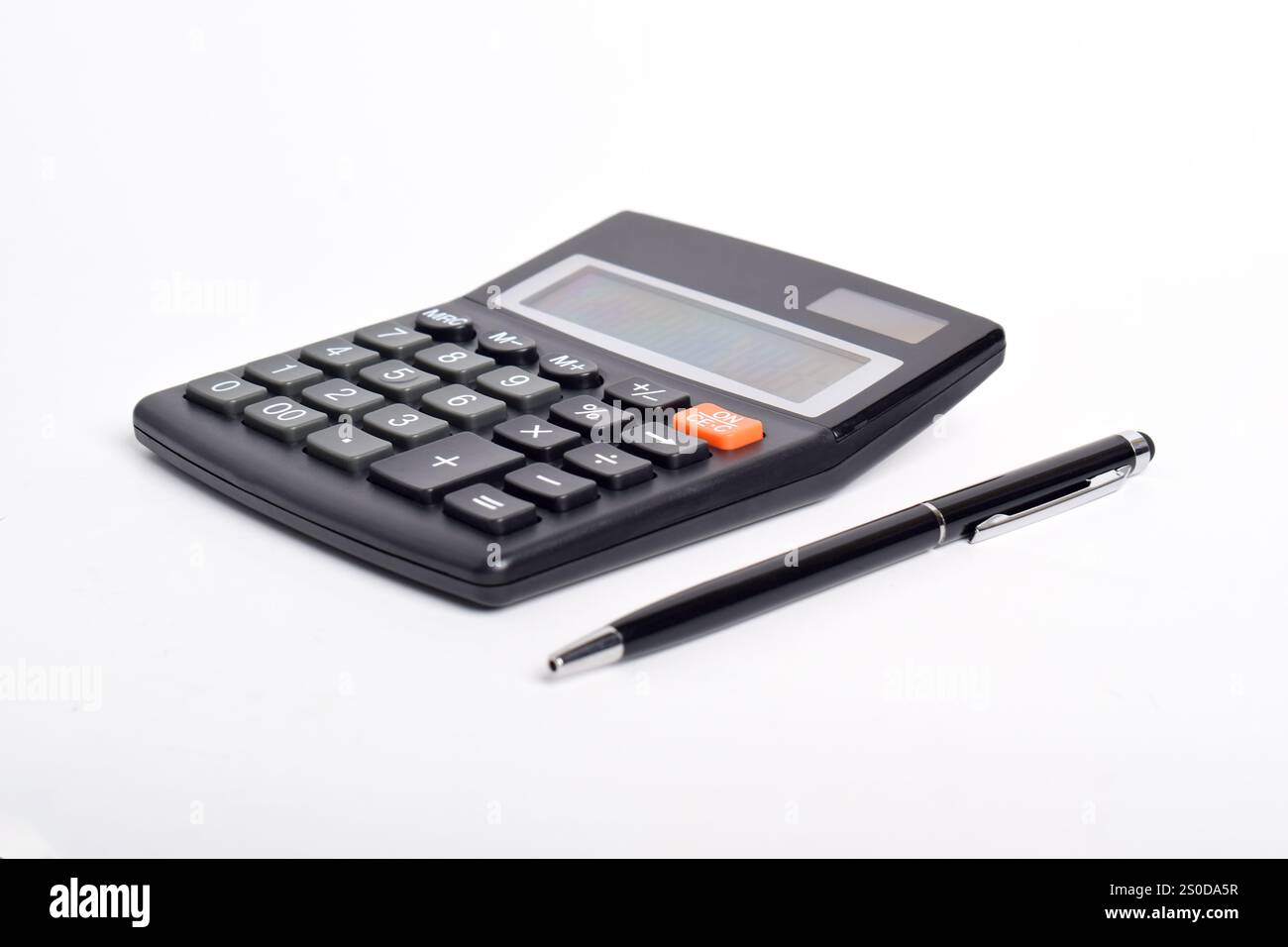 Black Calculator with pen isolated on white background. Financial ...