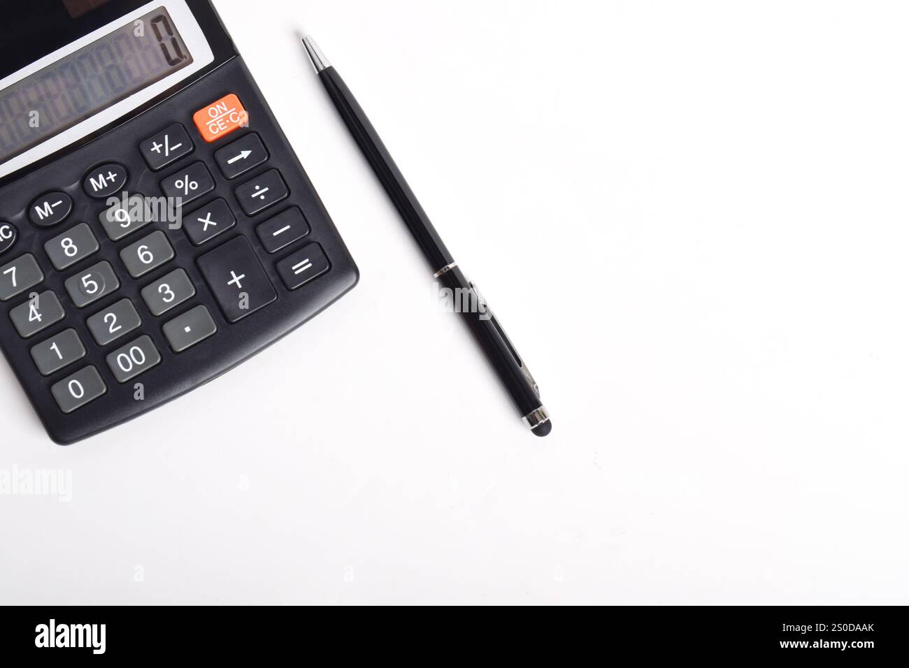 Black Calculator with pen isolated on white background. Financial ...