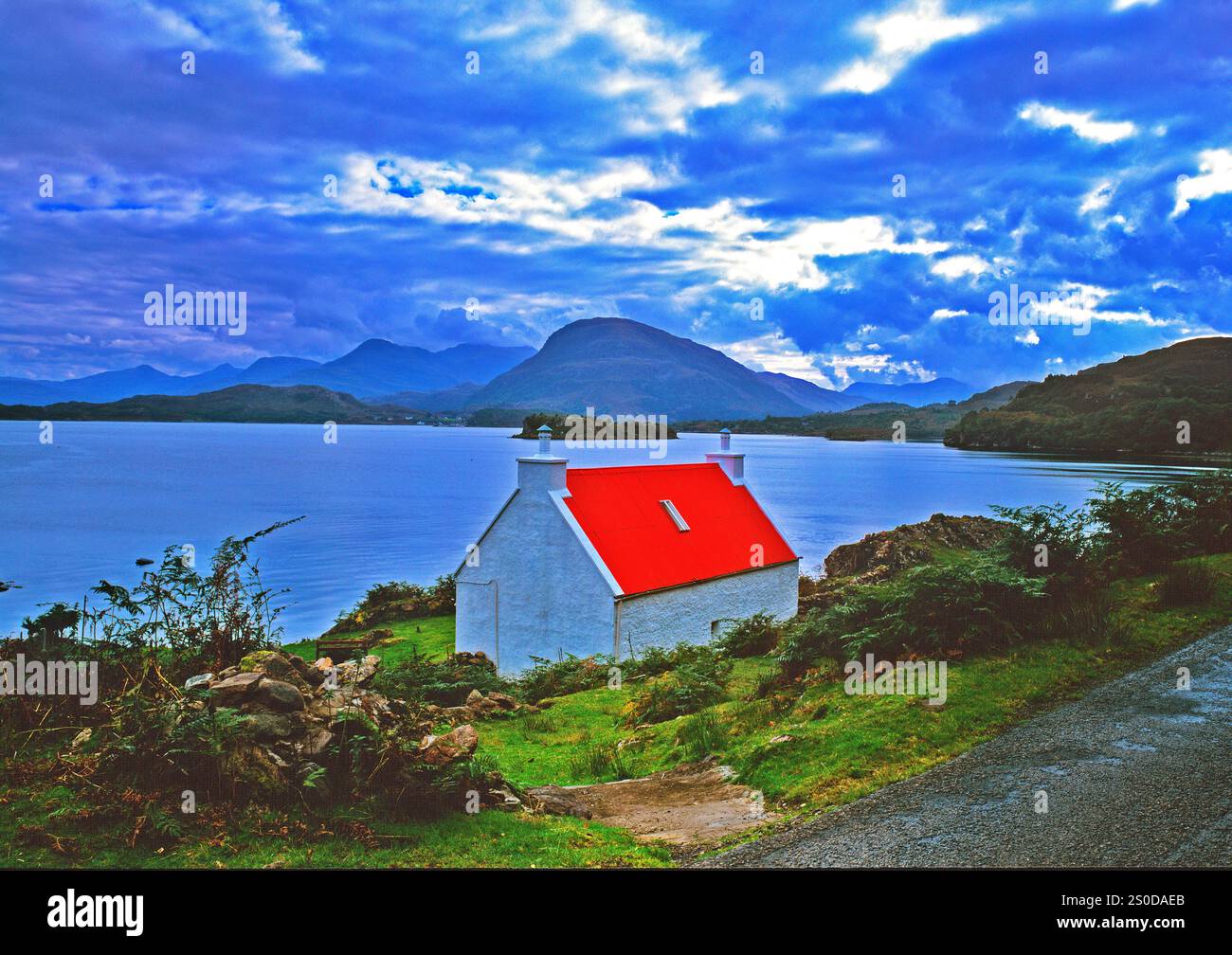 Red roof by loch Torridon Highlands Stock Photo - Alamy