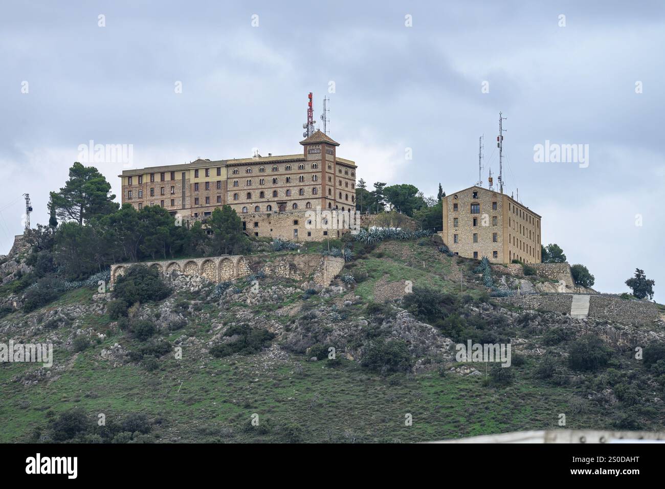 A scenic hilltop monastery with stone architecture, surrounded by ...