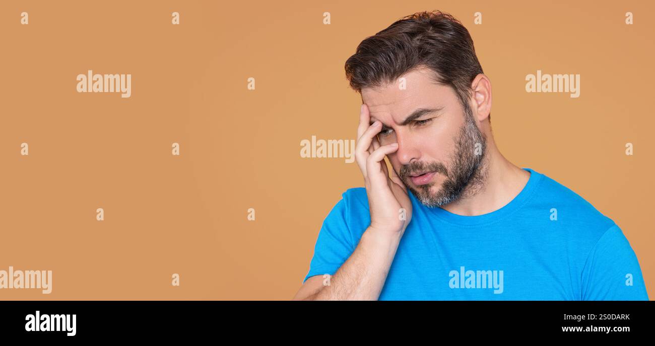Sad man got migraine. Man with strong headache. Stressed, tired man ...