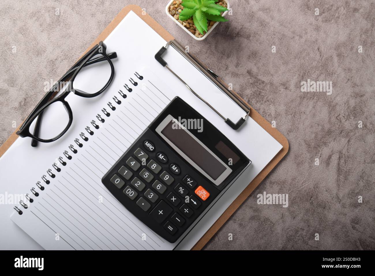 Bookkeeping workplace concept. Top view office accessories calculator ...