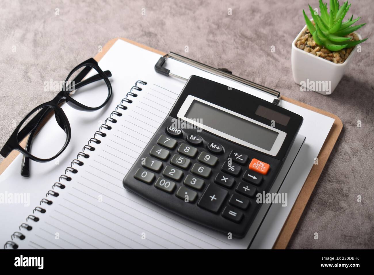 Bookkeeping workplace concept. Top view office accessories calculator ...
