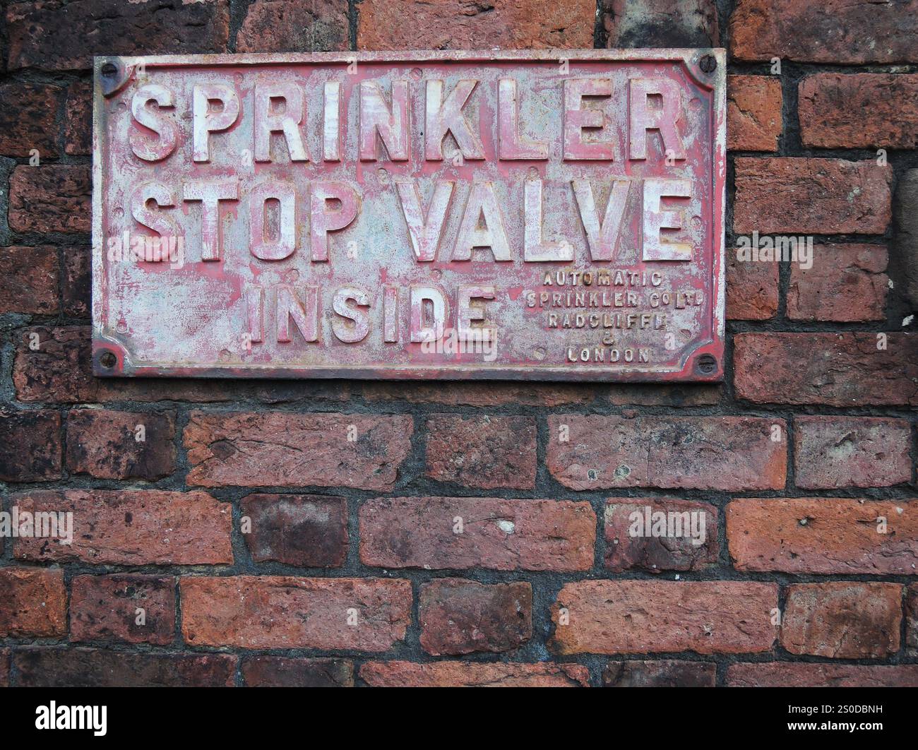 Stop Valve Sign on Brick Stock Photo - Alamy