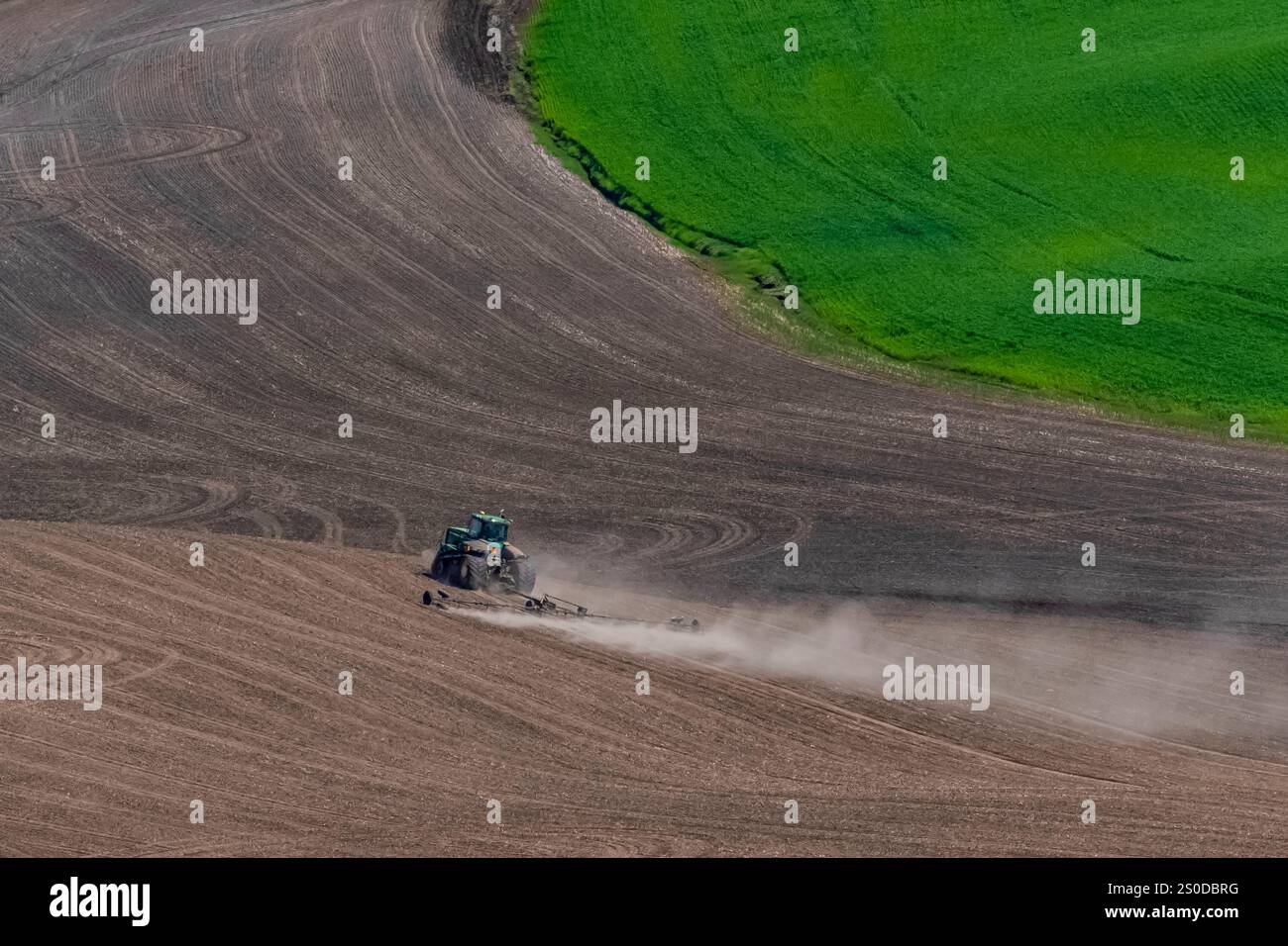 View of farmer tilling the land, from Kamiak Butte County Park in the ...