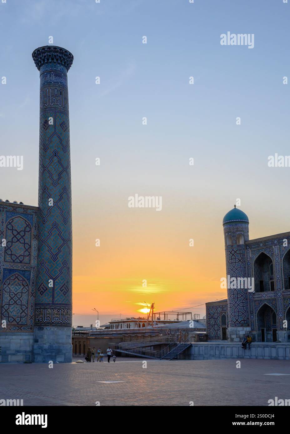SAMARKAND, UZBEKISTAN - MAY 18, 2024. Sunset over the minarets of the ...