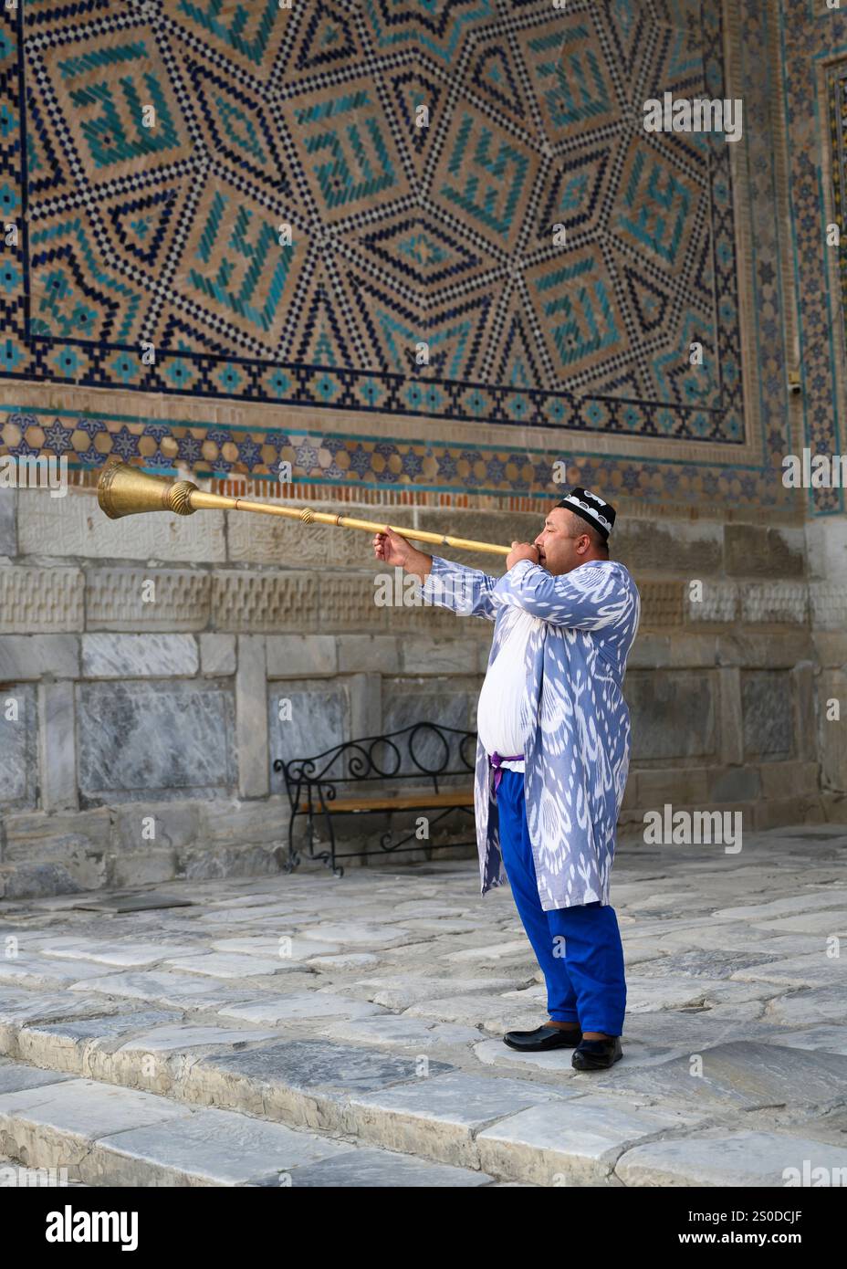 SAMARKAND, UZBEKISTAN - MAY 18, 2024. A musician in national dress ...