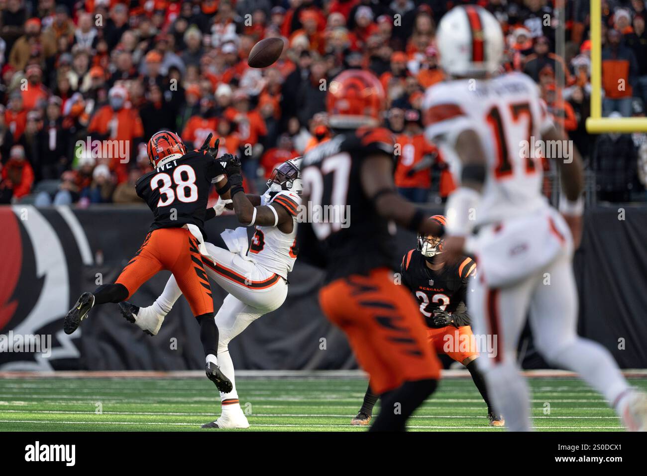 Cincinnati Bengals safety Geno Stone eyes a tipped pass off the hands ...