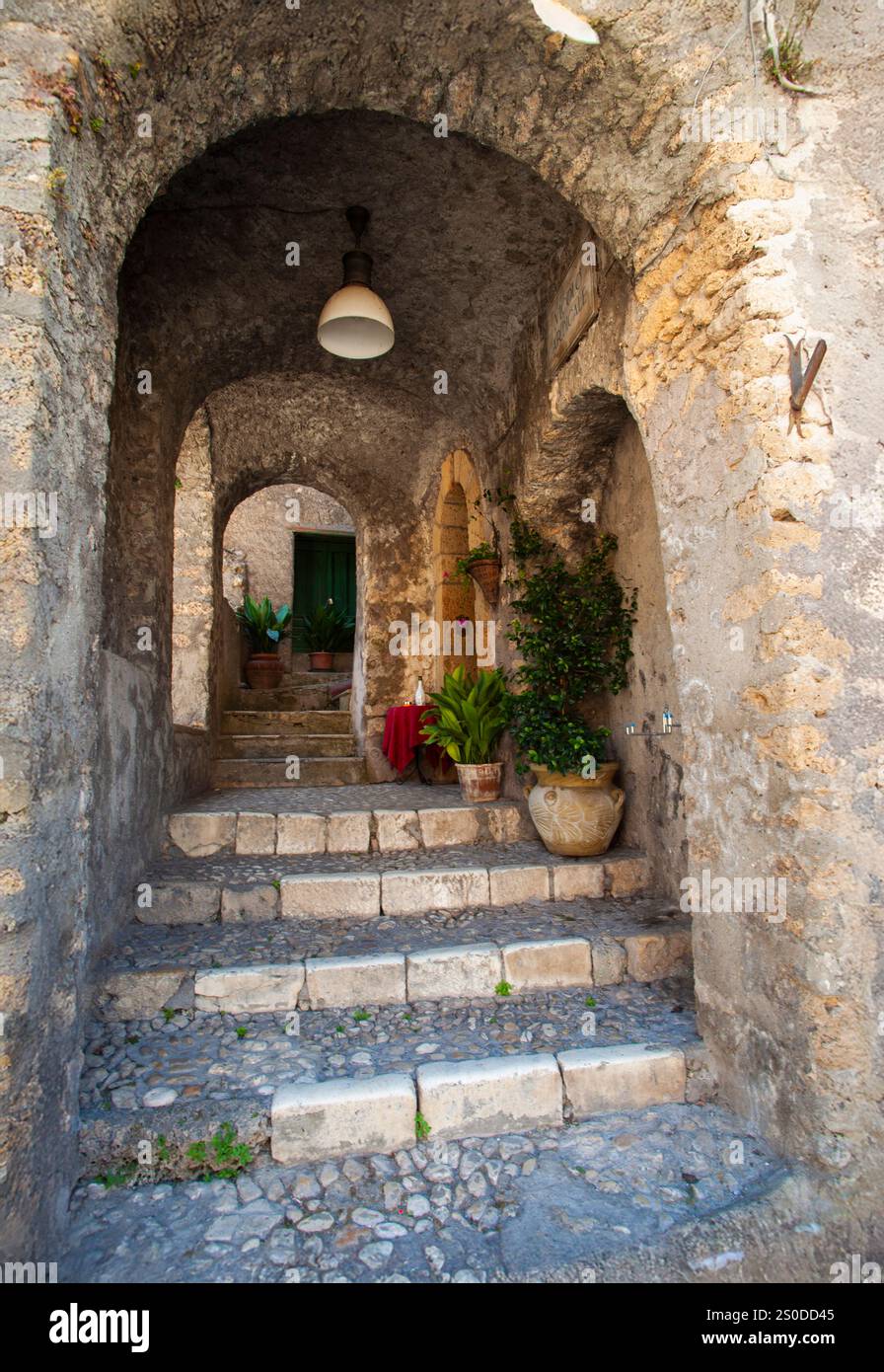 Medieval alley in Subiaco with stone arch and rustic charm Stock Photo ...
