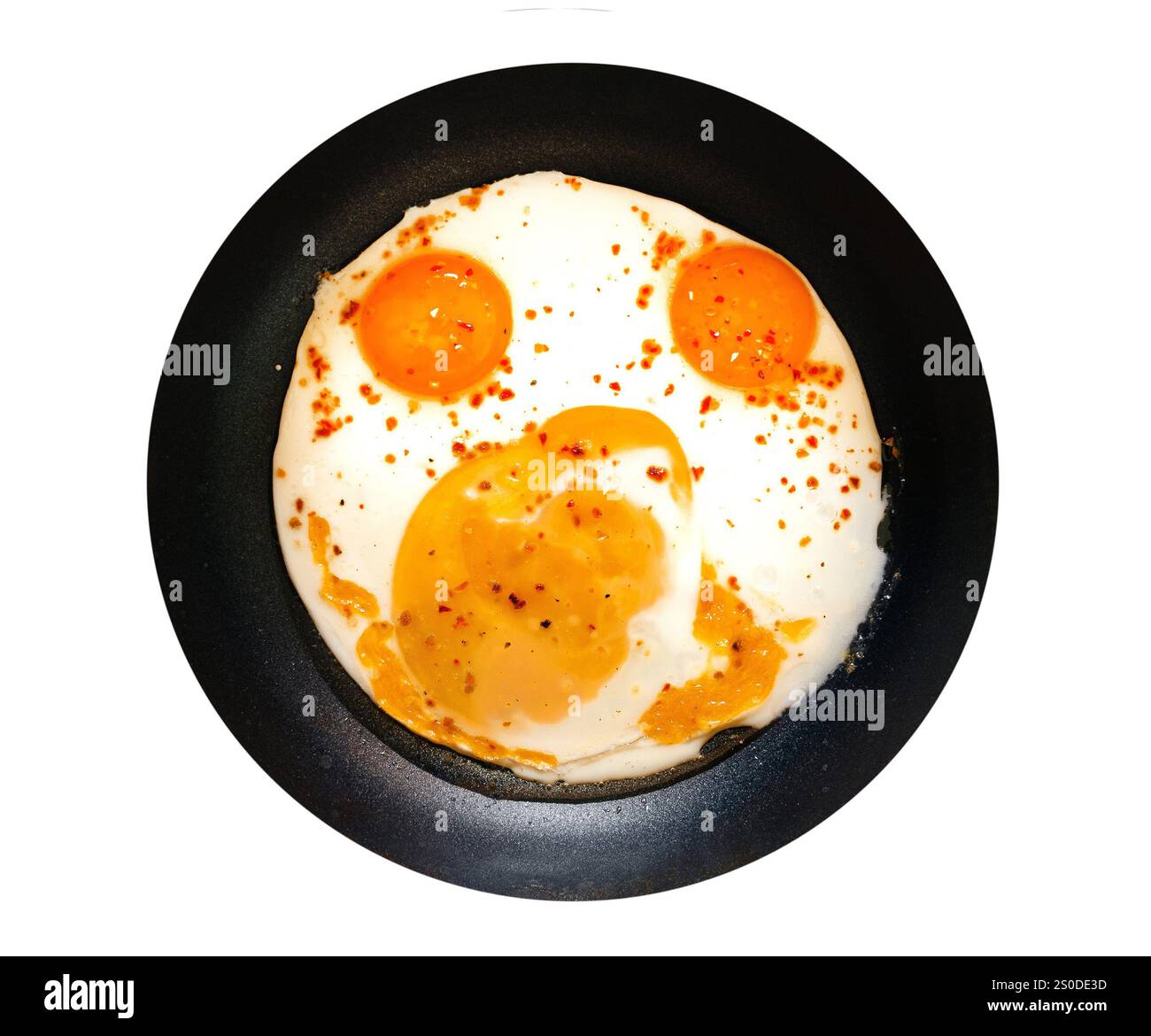 Fried egg creative smiling on frying pan Stock Photo - Alamy