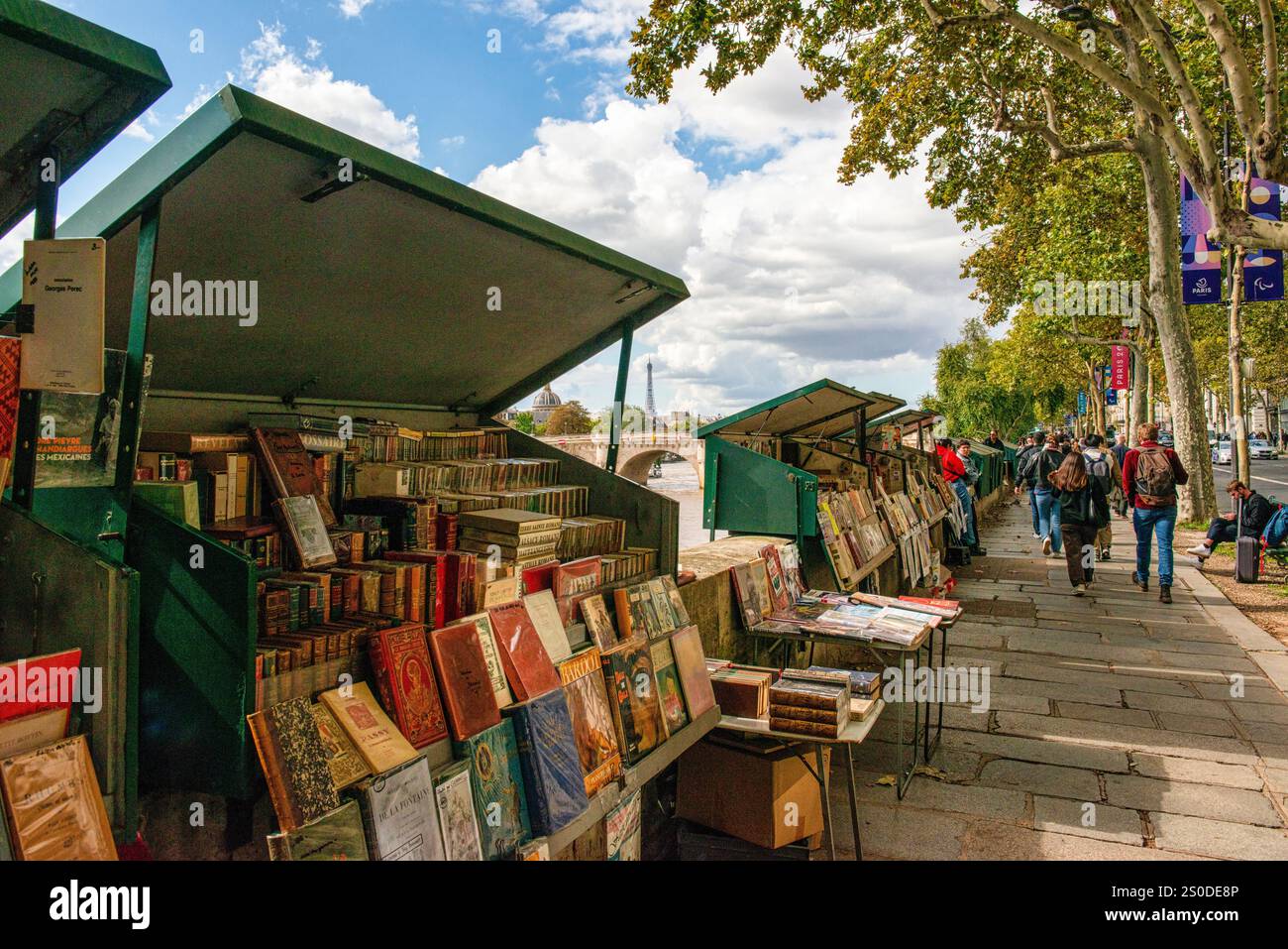 Book sellers with their small lock-up cabinets on the wall along the ...