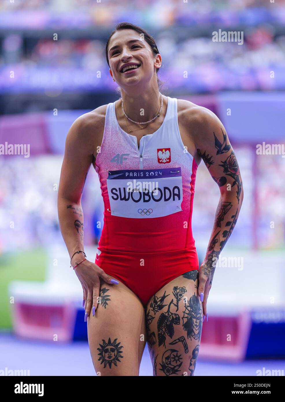 Ewa Swoboda participating in the 100 meters at the Paris 2024 Olympic ...