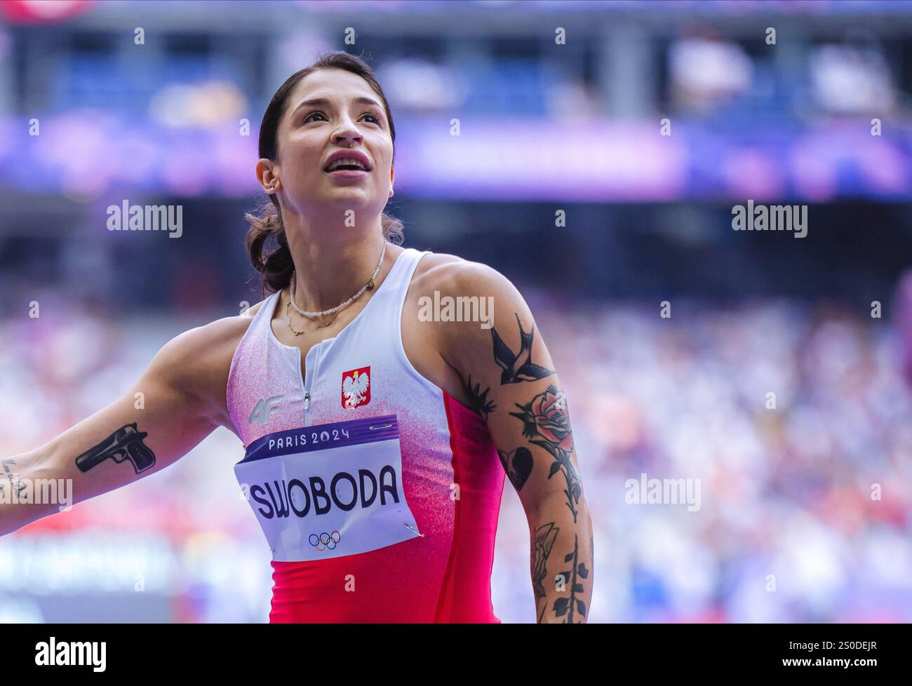 Ewa Swoboda participating in the 100 meters at the Paris 2024 Olympic ...