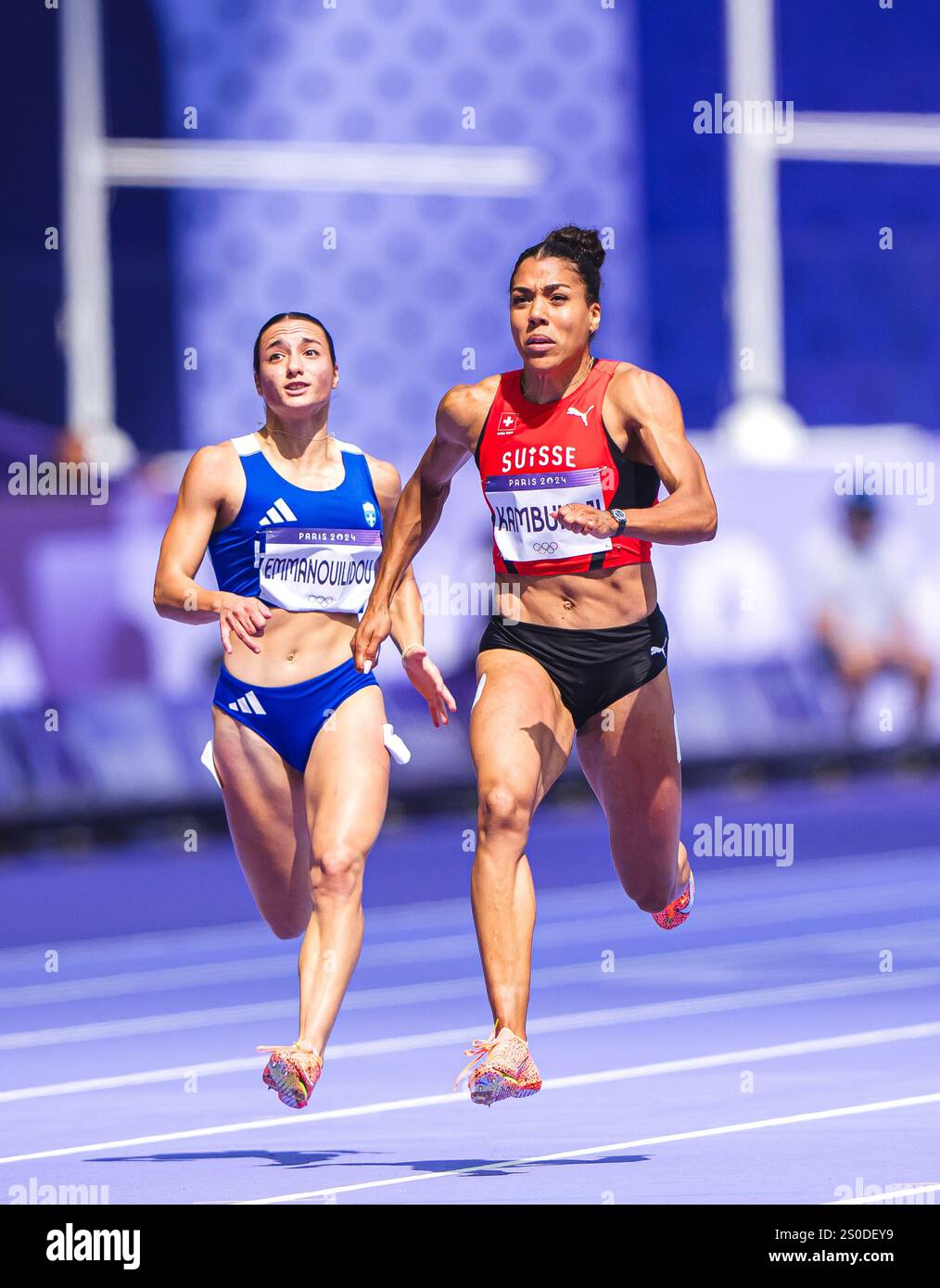 Mujinga Kambundji participating in the 100 meters at the Paris 2024 ...