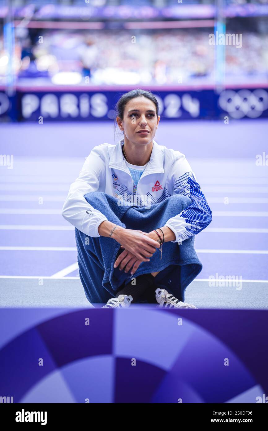 Daniela Stanciu participating in the high jump at the Paris 2024 ...
