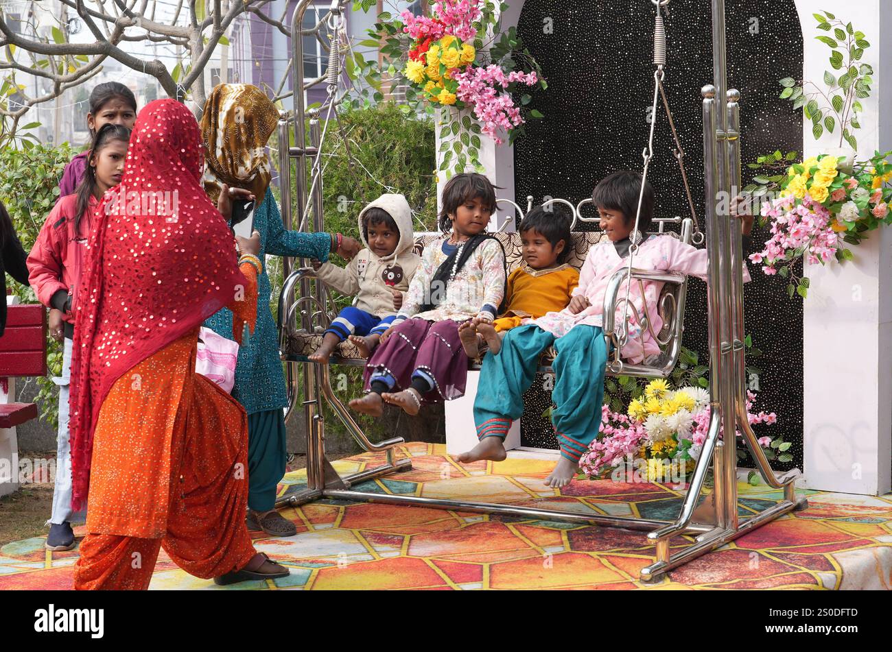 Beawar, Rajasthan, India, December, 25, 2024: A woman click a picture ...
