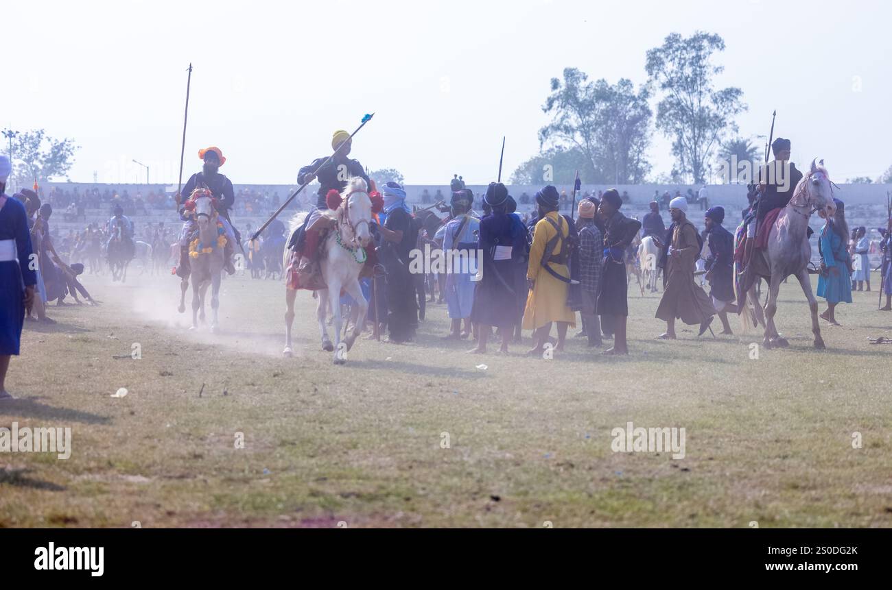 Group of sikh people (Nihang Sardar) during the celebration of Hola ...