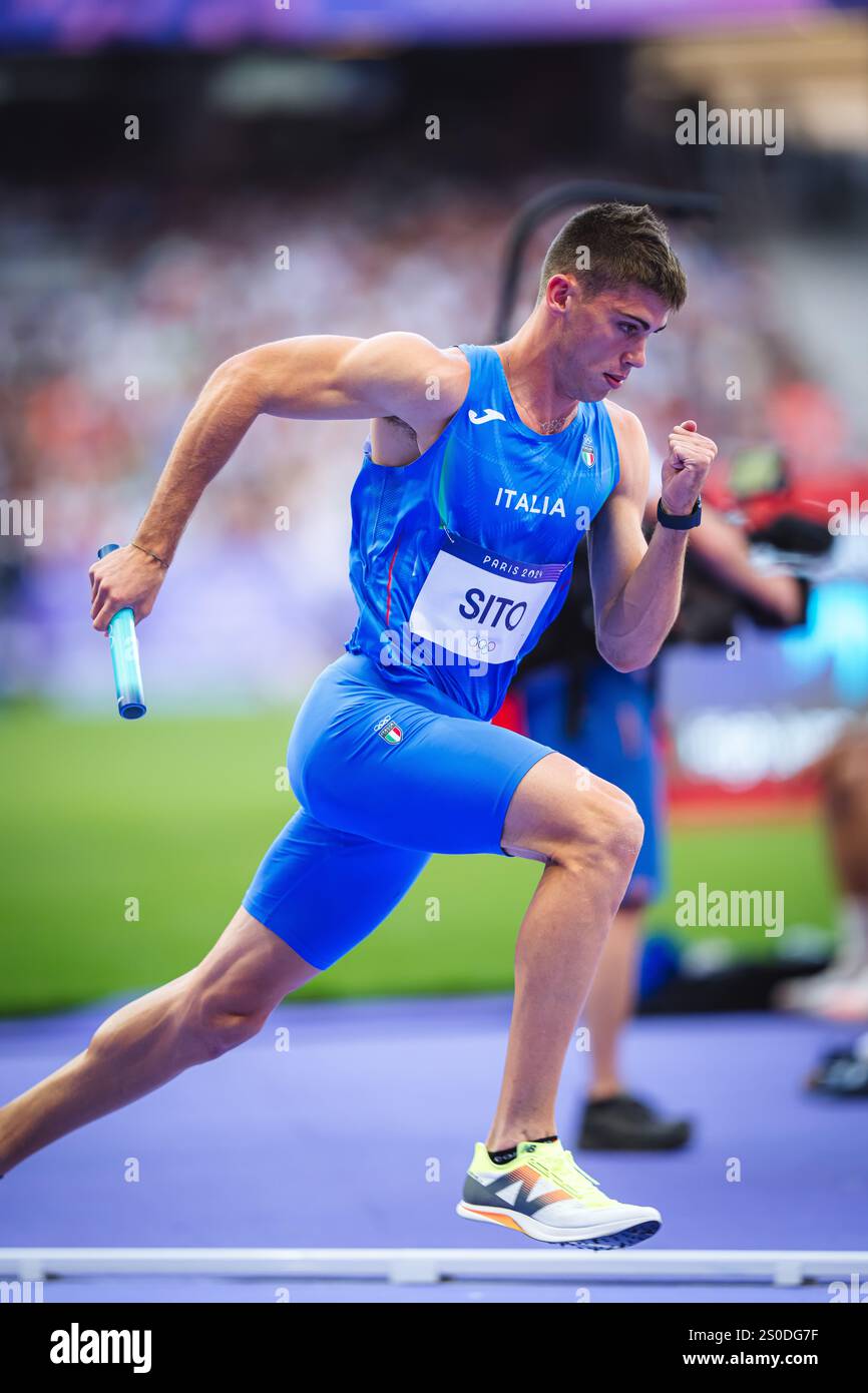 Luca Sito participating in the 4X400 meters relay at the Paris 2024 ...
