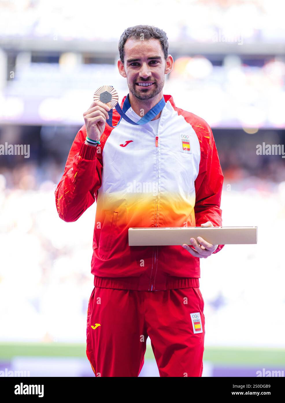 Alvaro Martin at the award ceremony and collecting her medal at the ...