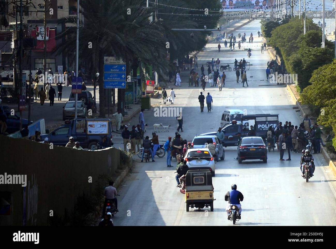 Activists of Majlis Wahdat-e-Muslimeen (MWM) are blocked road as they ...