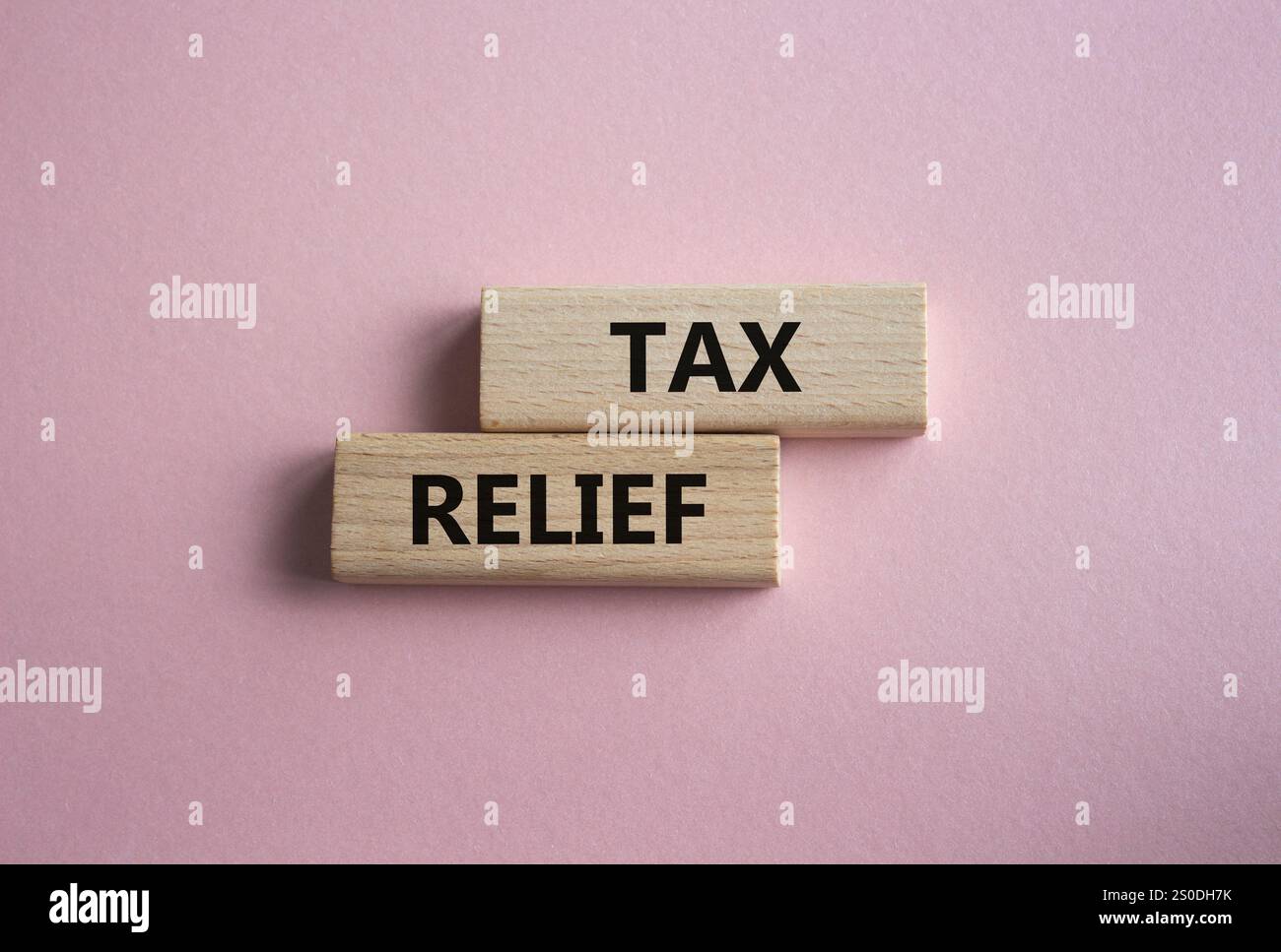 Tax Relief symbol. Concept word Tax Relief on wooden blocks. Beautiful ...