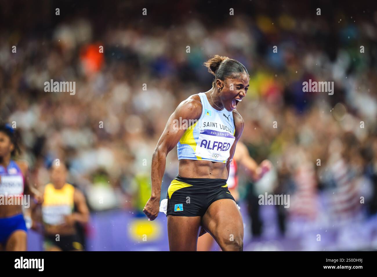 Julien Alfred winning in the 100 meters relay at the Paris 2024 Olympic ...