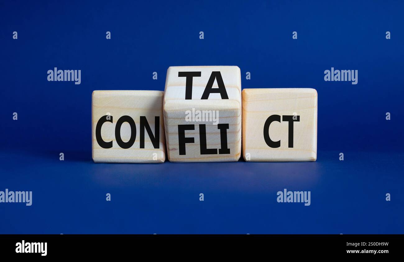 Contact and Conflict symbol. Wooden cubes with words Contact and ...