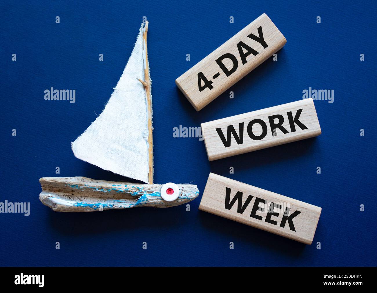 4-day work week symbol. Concept words 4-day work week on wooden blocks ...