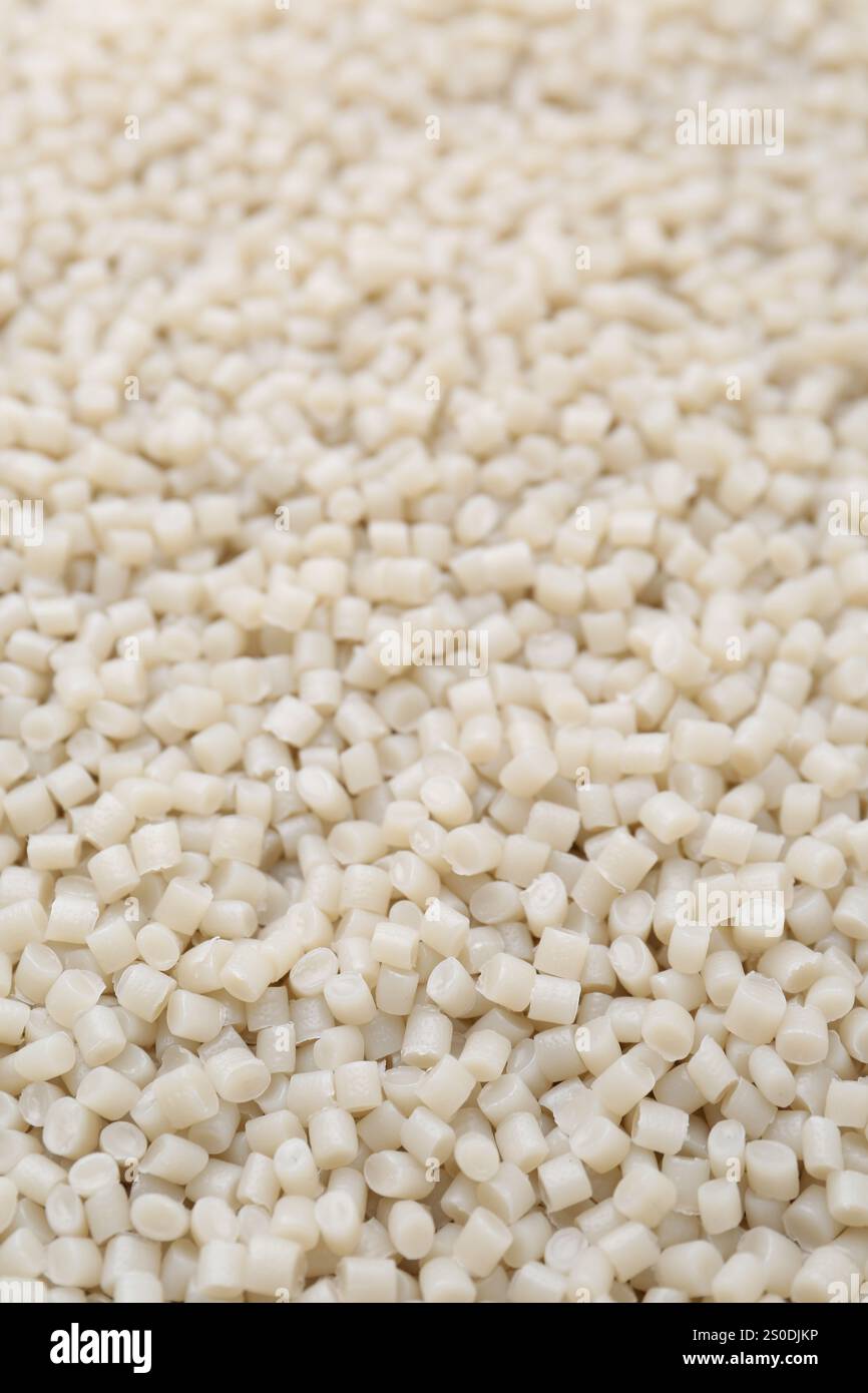 Pile of plastic granules as background, closeup Stock Photo - Alamy