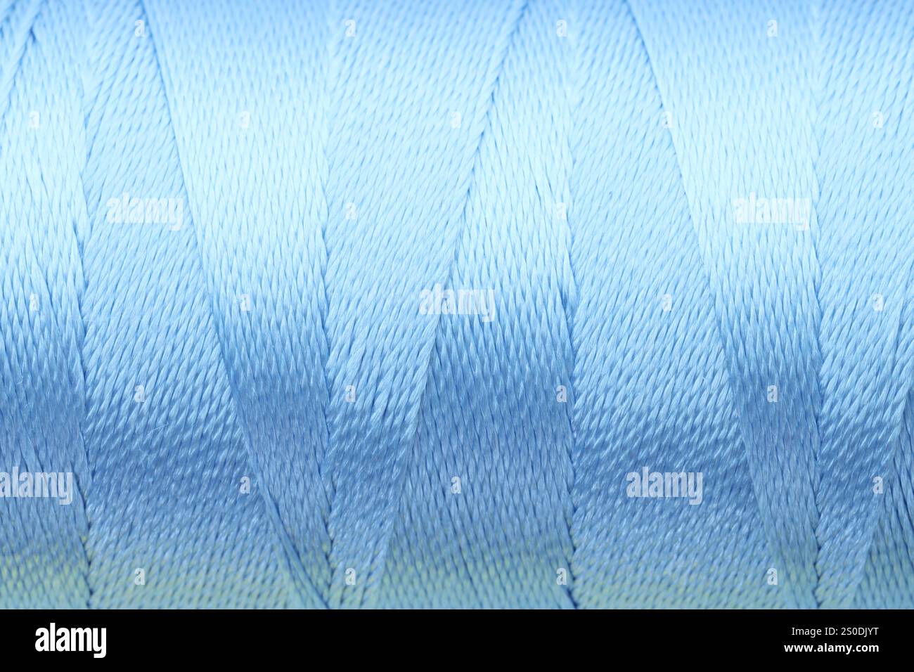 Beautiful light blue sewing thread as background, closeup Stock Photo ...