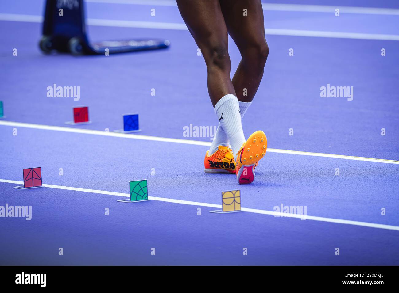Mikaelle Assani participating in the long jump at the Paris 2024 ...