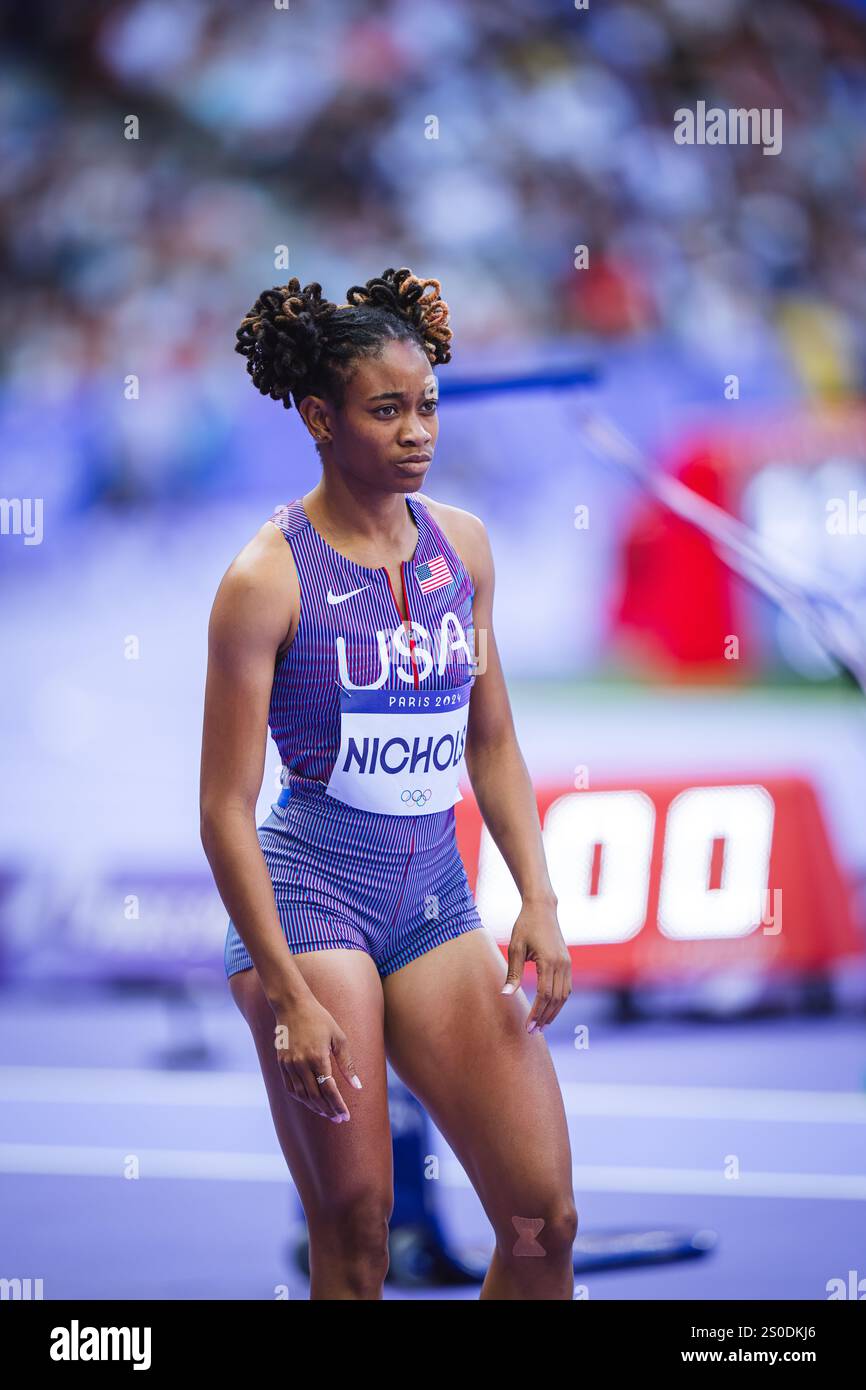Monae' Nichols participating in the long jump at the Paris 2024 Olympic ...