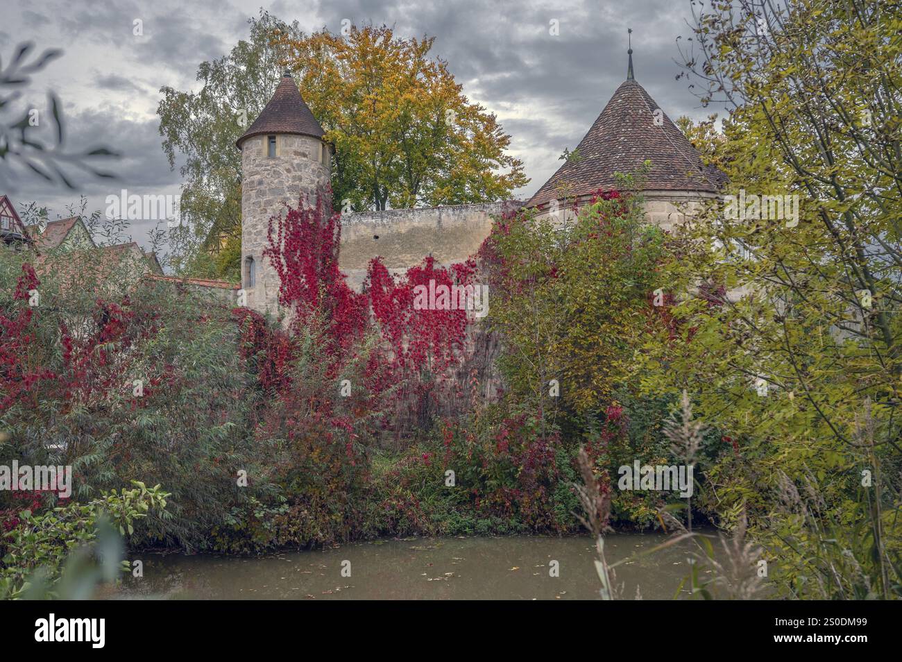 Towers of the medieval defence wall around 1200, in front the Woernitz ...
