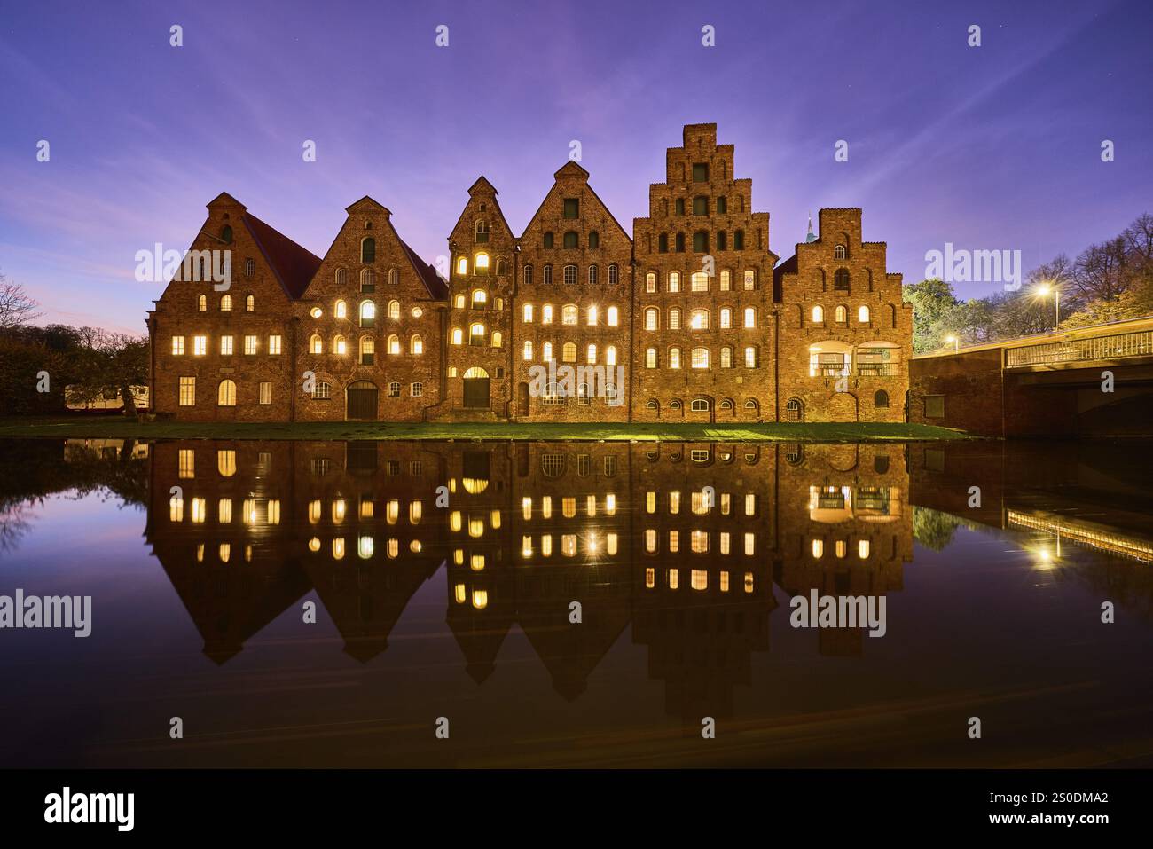 Salt storehouse, historic brick buildings, illuminated windows ...
