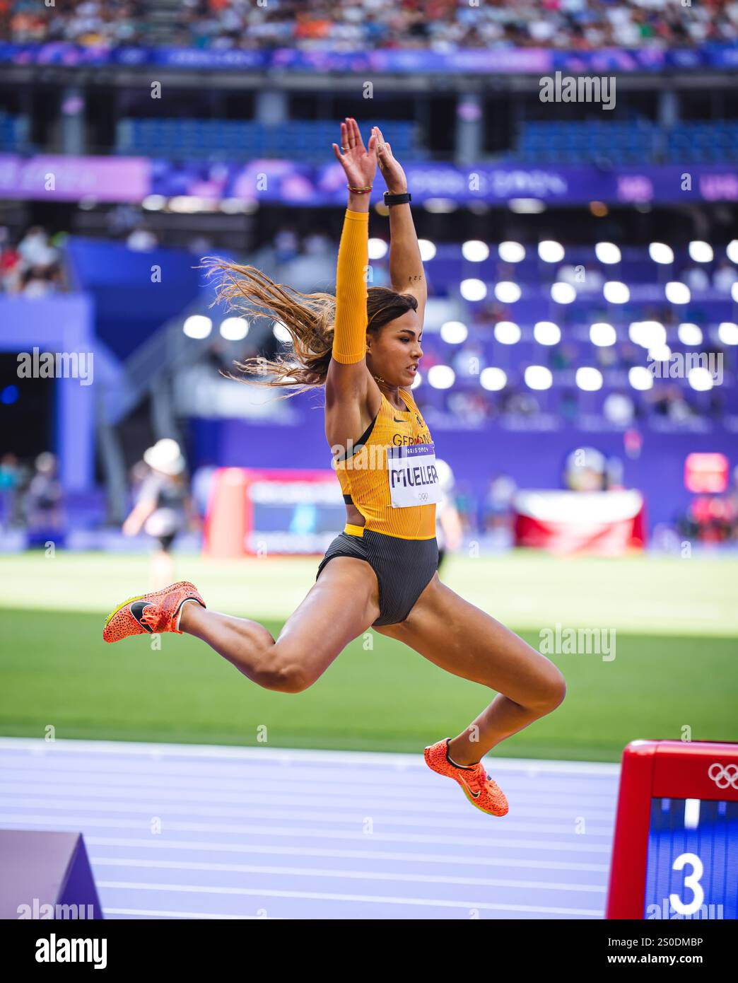 Mikaelle Assani participating in the long jump at the Paris 2024 ...