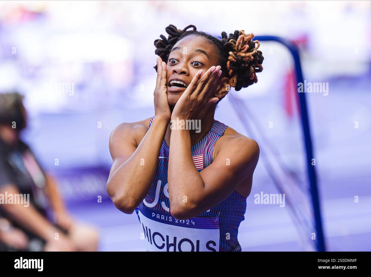 Monae' Nichols participating in the long jump at the Paris 2024 Olympic ...