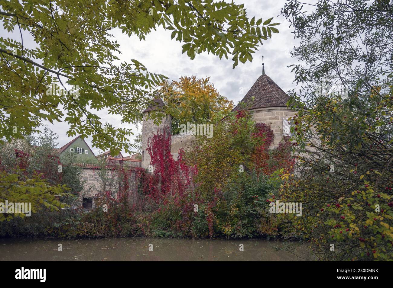 Towers of the medieval defence wall around 1200, in front the Woernitz ...