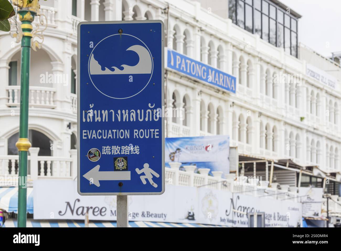 Tsunami Hazard Zone. Warning sign, signposting of escape routes in the ...