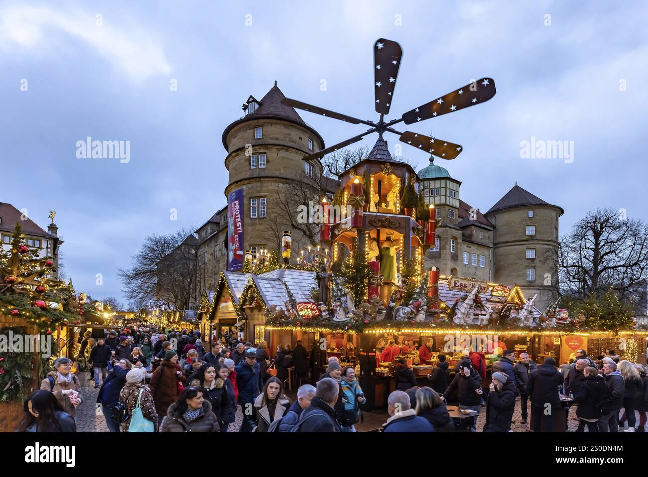 Stuttgart Christmas market at the blue hour. Christmas pyramid in front ...