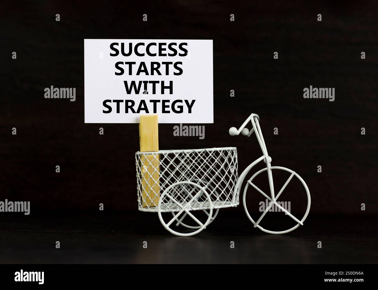 Success starts with strategy symbol. Concept words Success starts with ...